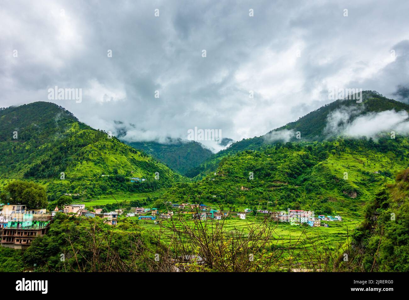 A wide angle shot of a village in the mountains of Lower Himalayan ...