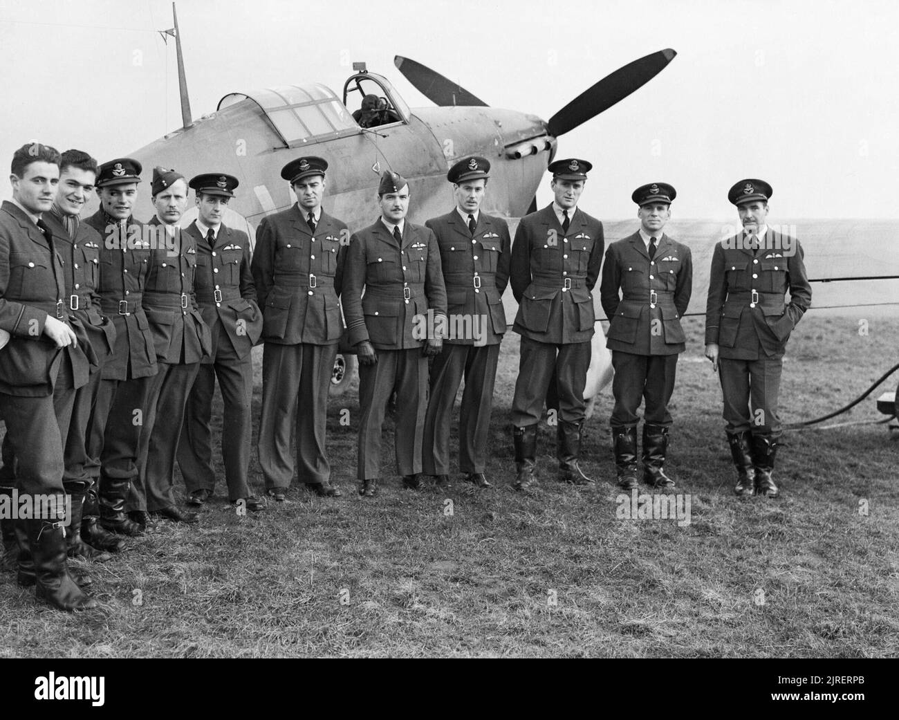 Pilots of No. 1 Squadron RCAF with one of their Hawker Hurricanes at ...