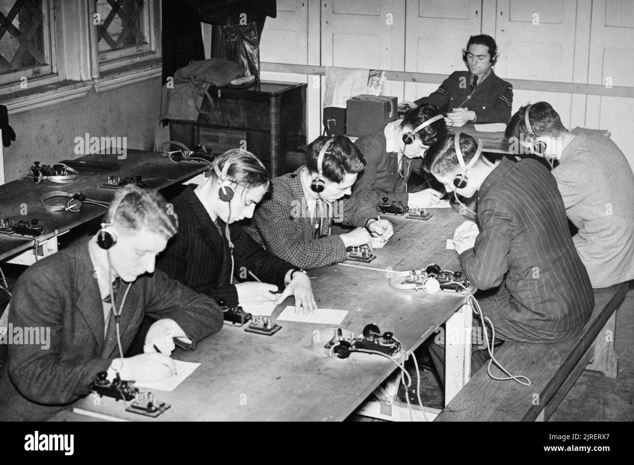 Recruits take a Morse Code test at the RAF Aircrew Reception Centre at ...