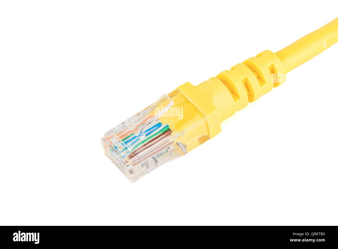 Close-up of an 8-pin RJ-45 computer connector on a yellow cable over a ...
