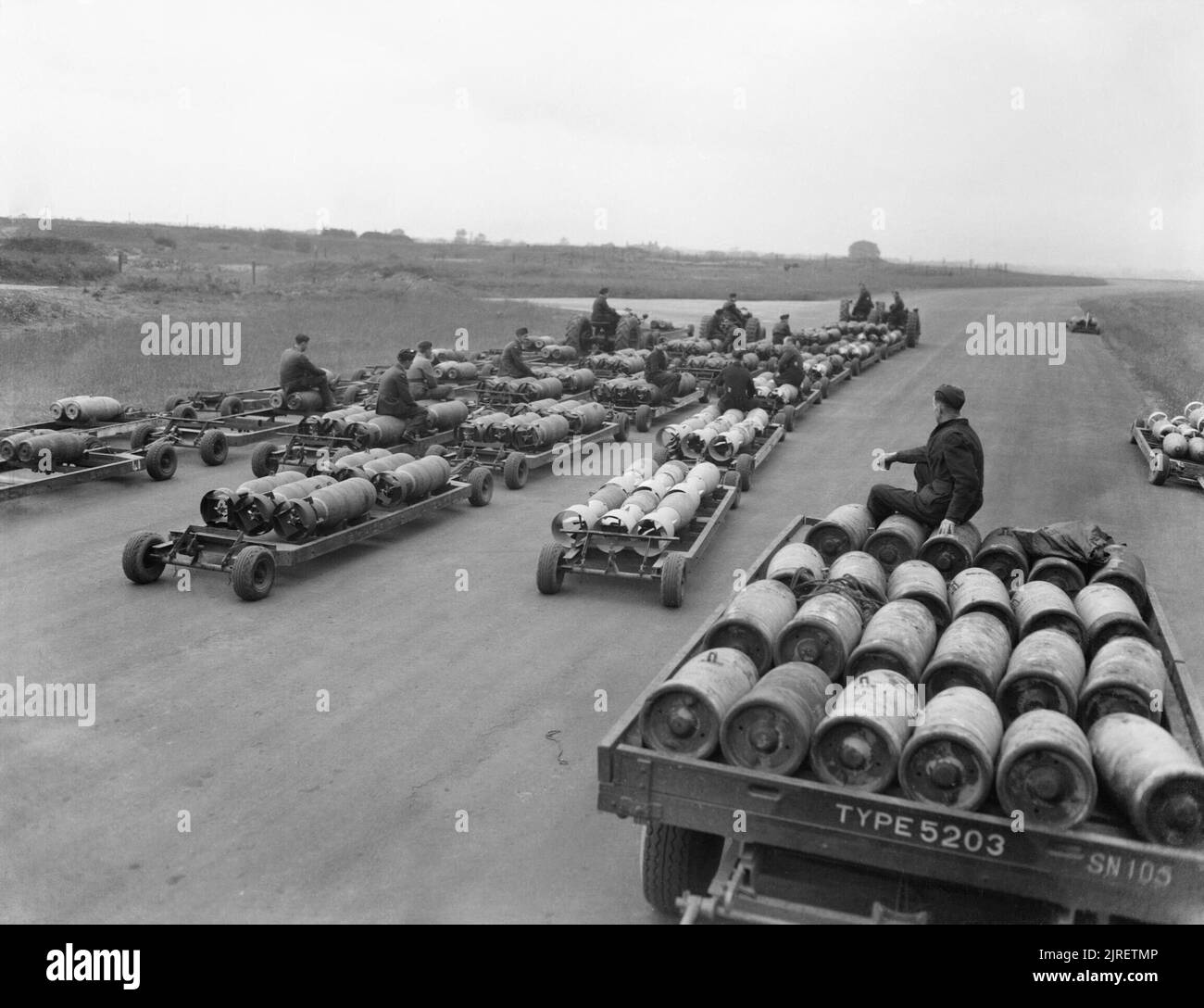 Royal Air Force Bomber Command, 1942-1945. Trolleys loaded with 500-lb ...