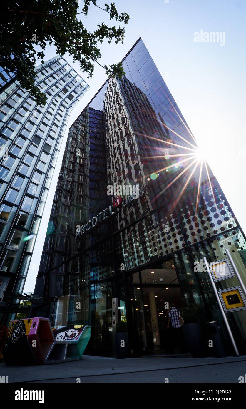 Hamburg, Germany. 24th Aug, 2022. The Dancing Towers are reflected in ...