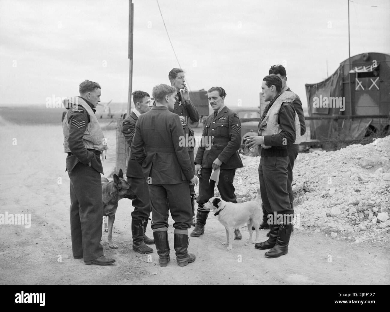 Spitfire pilots of No. 19 Squadron RAF gather at Manor Farm, Fowlmere ...
