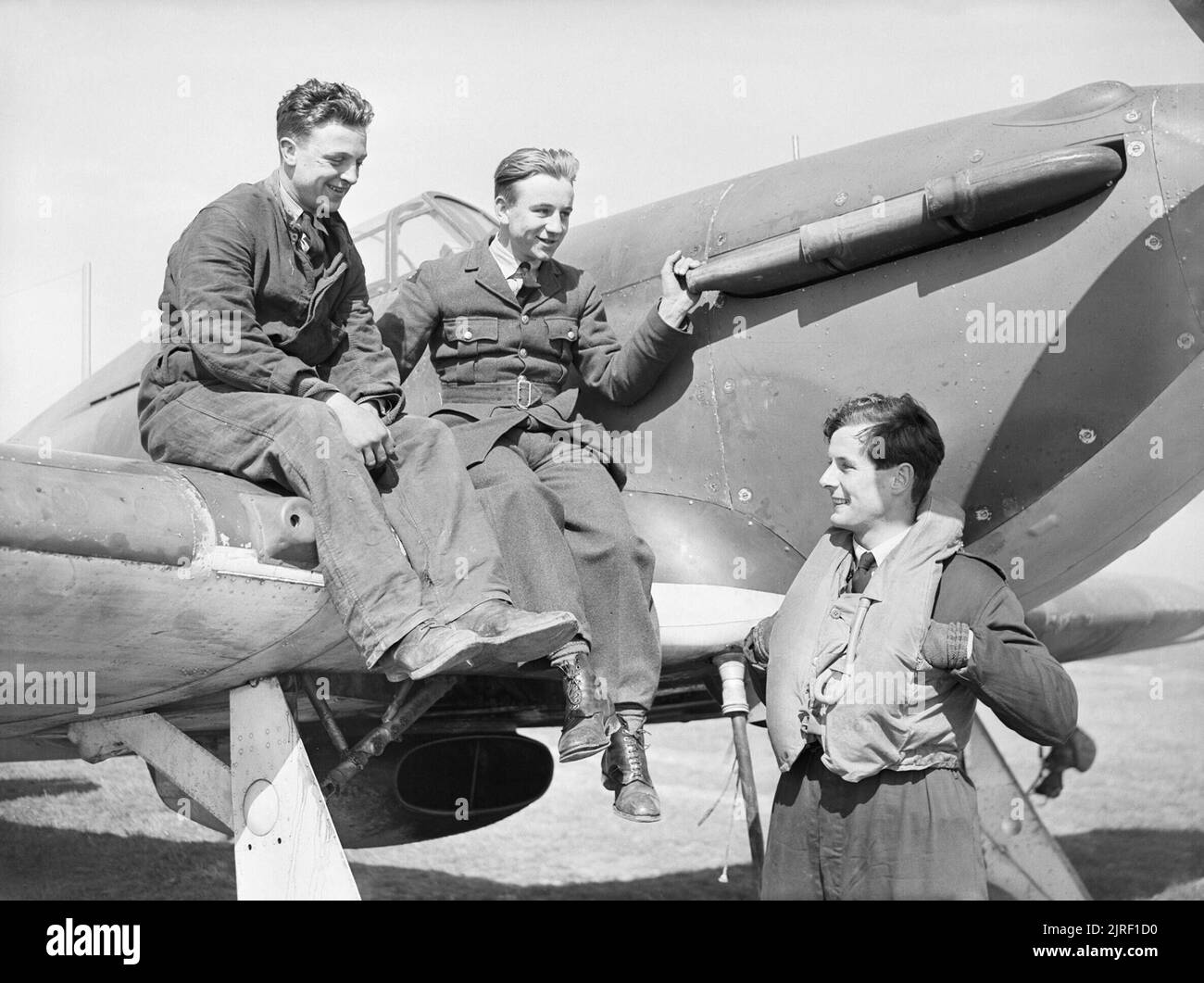 Squadron Leader Peter Townsend chatting with ground crew on his Hawker ...