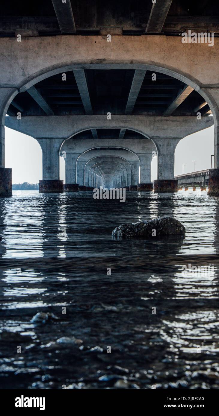 A vertical shot of the bottom of a bridge Stock Photo - Alamy
