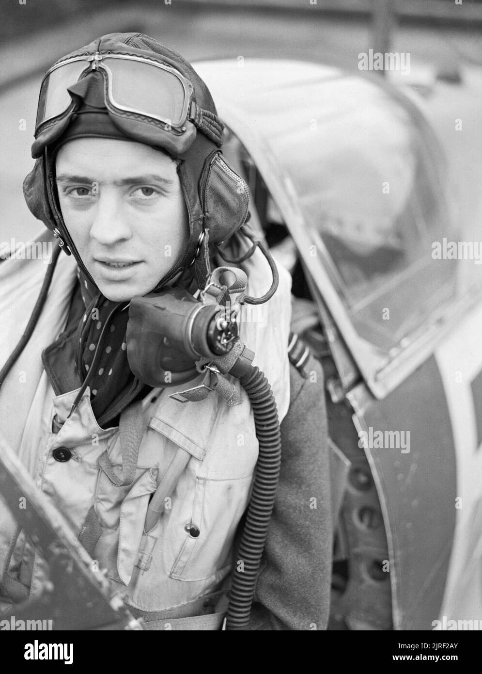 Wing Commander Richard 'Dickie' Milne in the cockpit of his Spitfire Mk ...