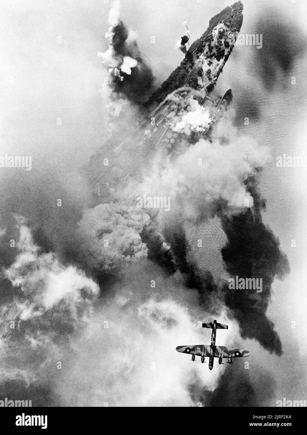 An Avro Lancaster of No. 514 Squadron RAF over the target during a ...