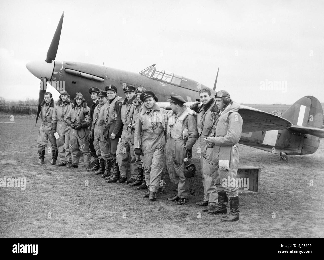 American pilots of No. 71 (Eagle) Squadron RAF gathered in front of one ...
