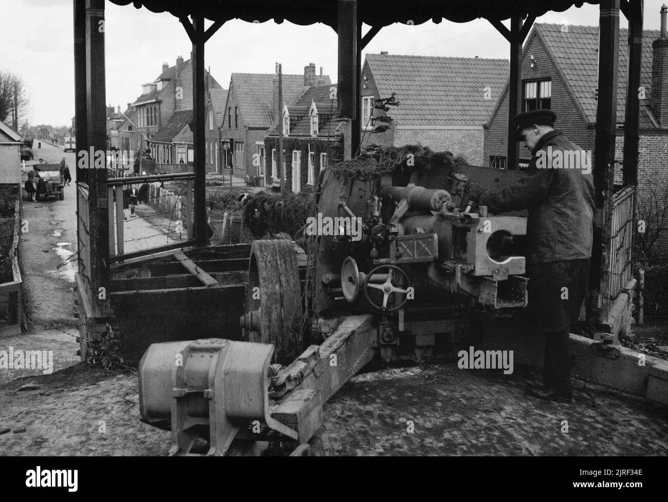 A German 75mm anti-tank gun emplaced in a bandstand at Nieuland, near ...