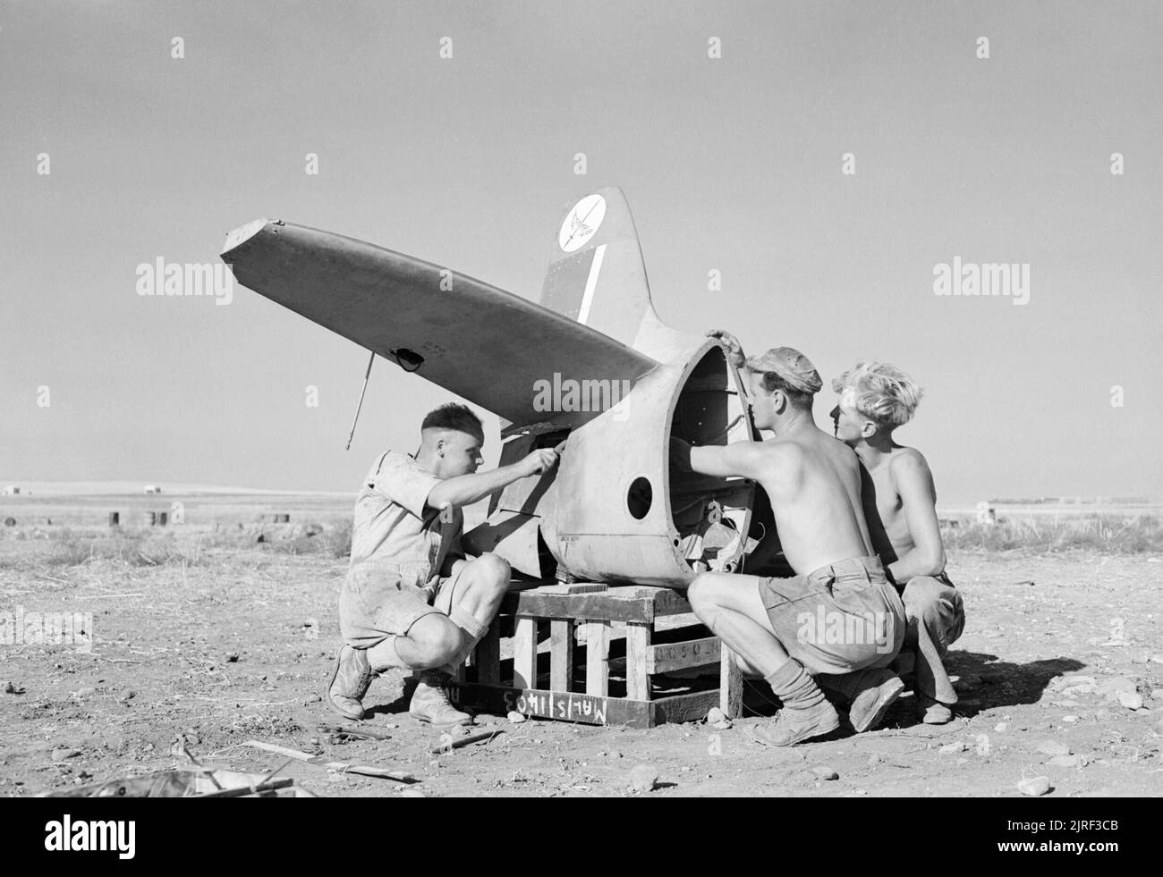 A party of riggers working on the tailplane of a Supermarine Spitfire ...