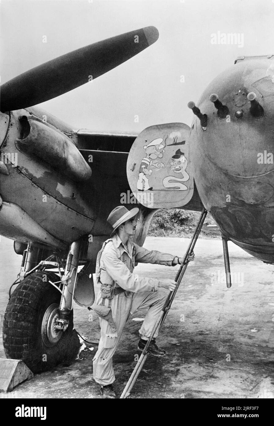 Flight Lieutenant A Torrance of 'A' Flight, No. 27 Squadron RAF, climbs ...