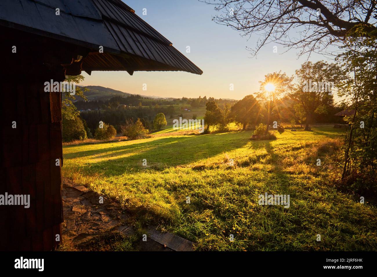 Tree farmhouse in sunset view hi-res stock photography and images - Alamy