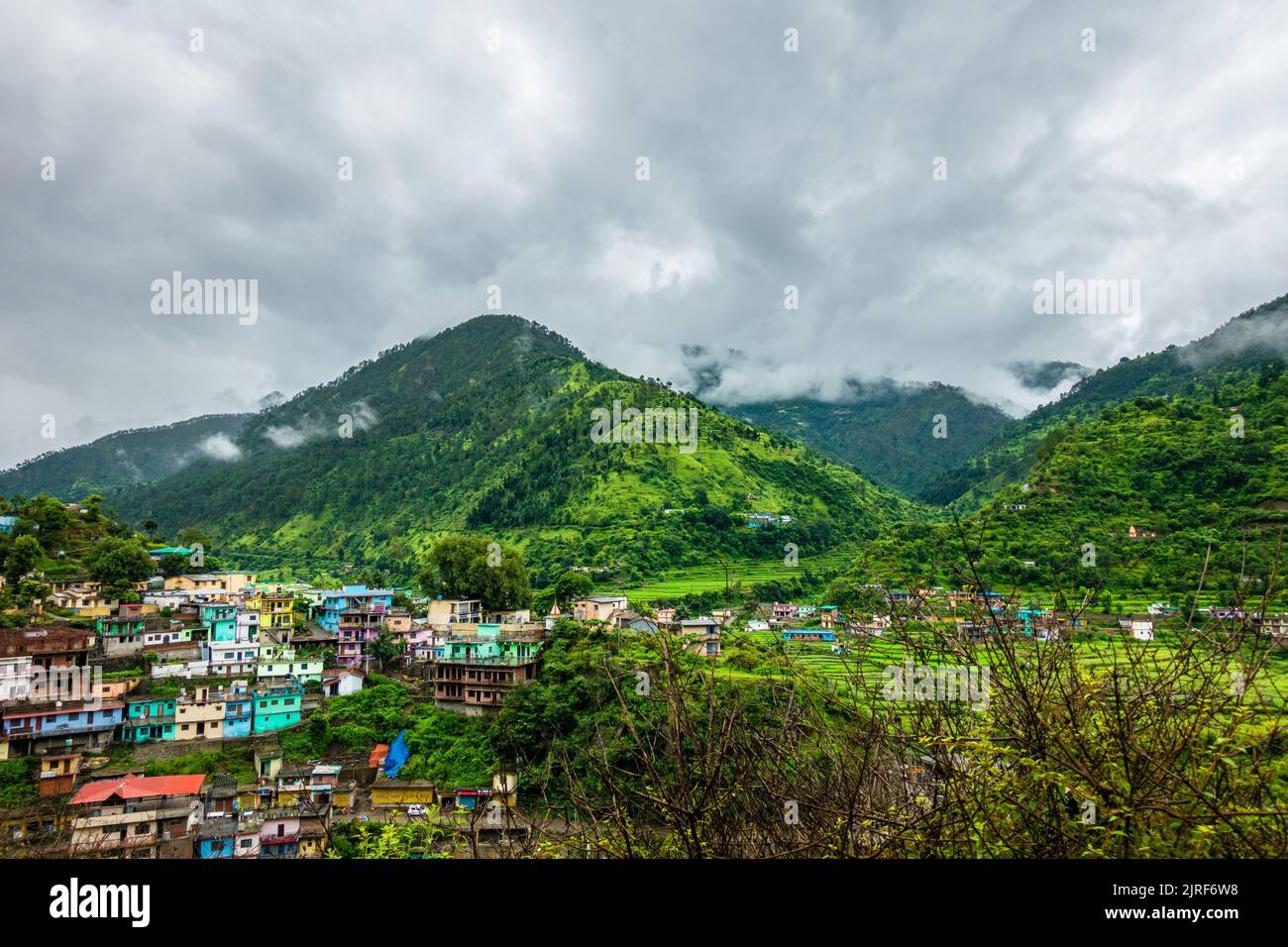 A wide angle shot of a village in the mountains of Lower Himalayan ...