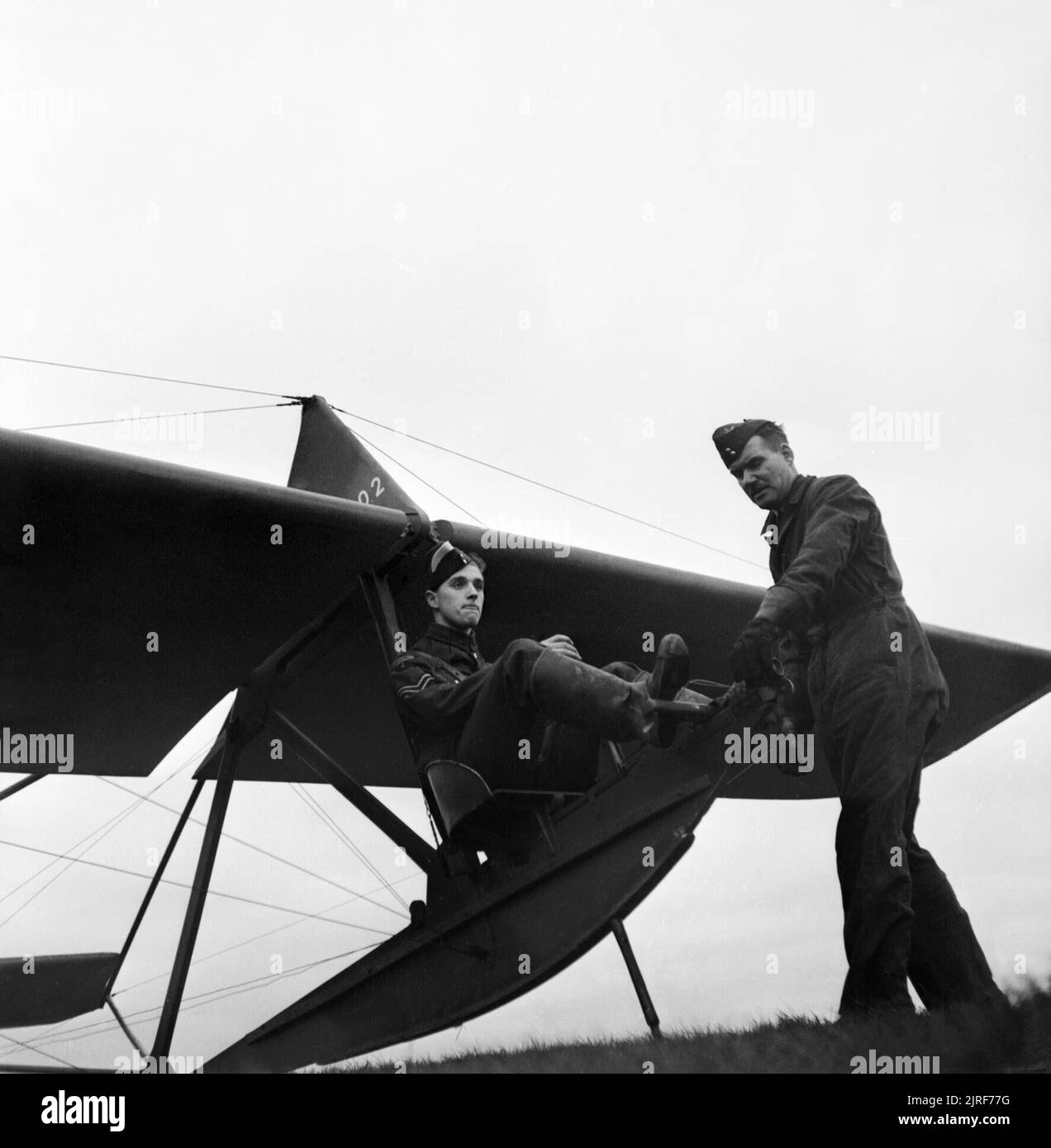 Corporal George Metcalfe of the Air Training Corps receives instruction ...
