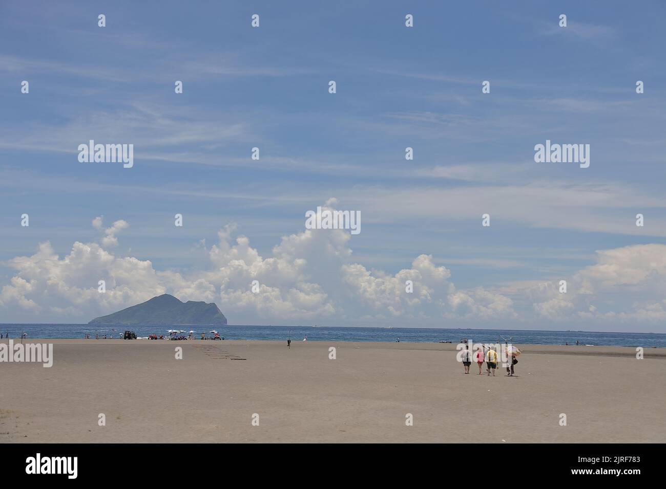 a hot day on the beach and blue sky with beautiful clouds in summer ...