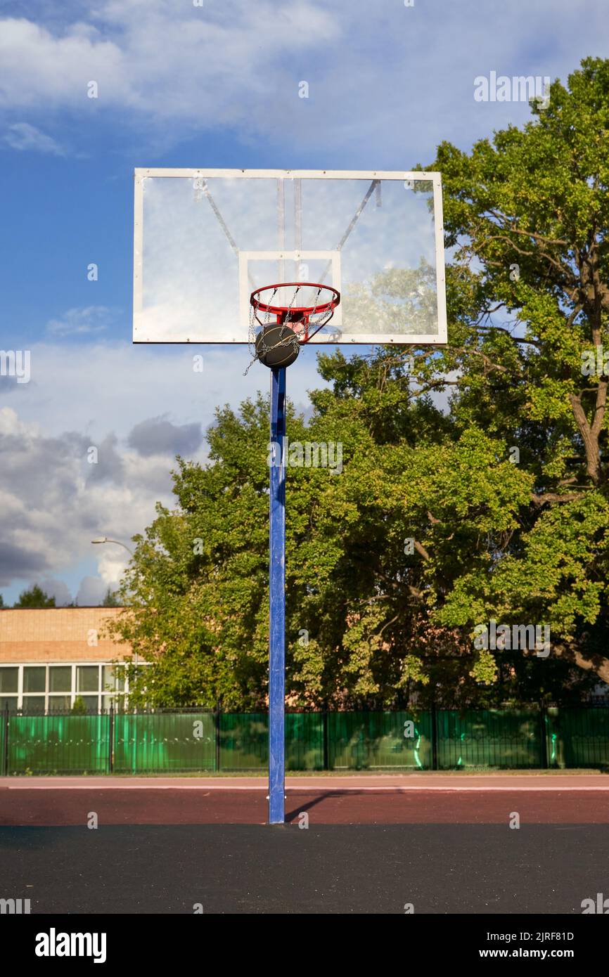Street basketball ball falling into the hoop. Concept of success ...