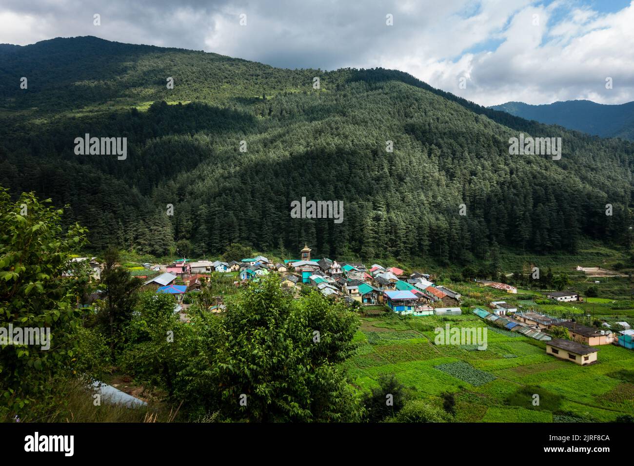 A wide angle shot of a village in the mountains of Lower Himalayan ...