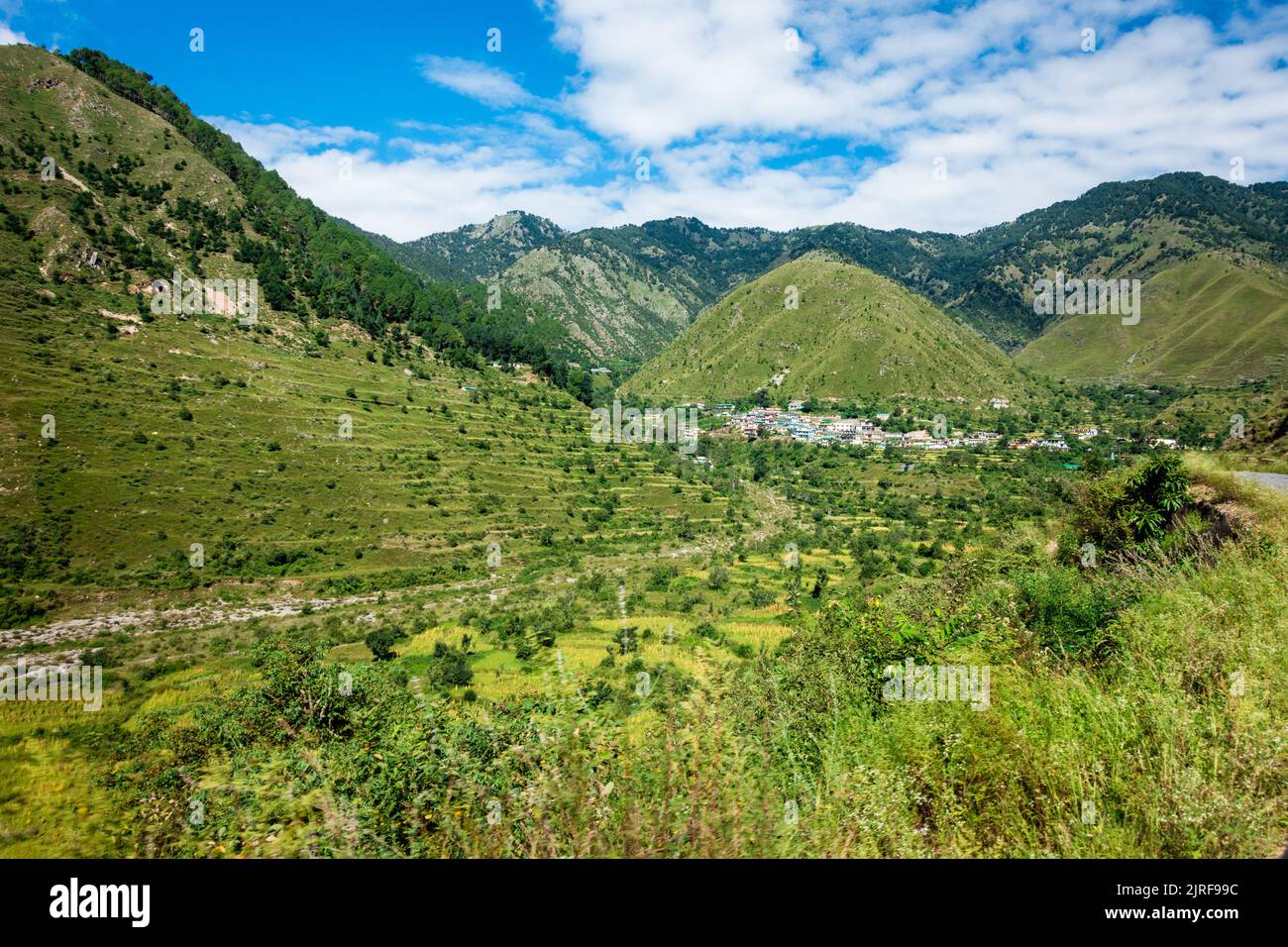 A wide angle shot of a village in the mountains of Lower Himalayan ...