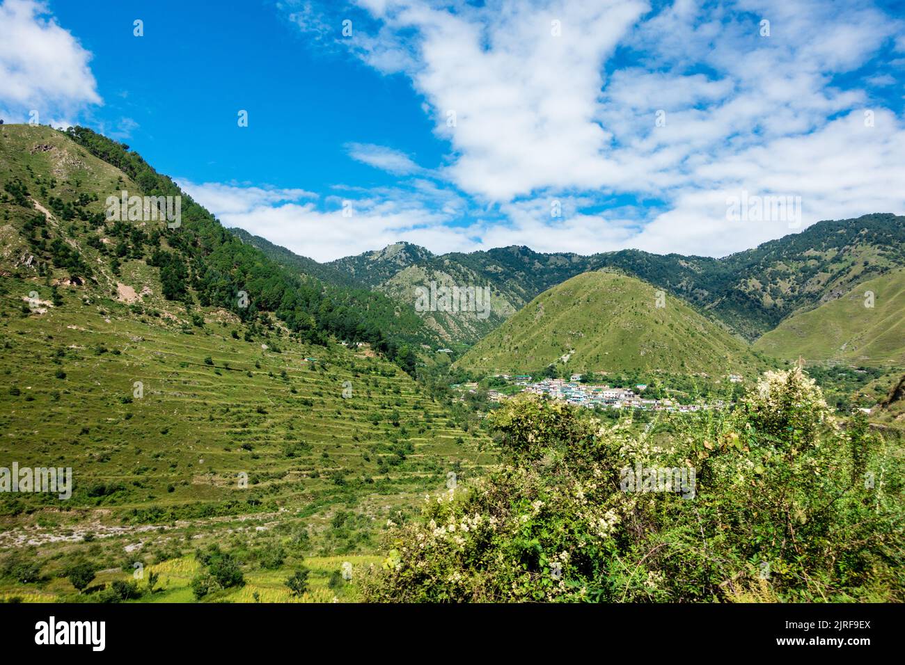 A wide angle shot of a village in the mountains of Lower Himalayan ...