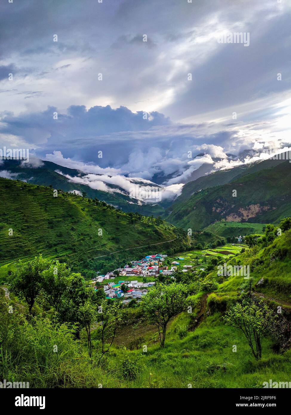 A wide angle shot of a village in the mountains of Lower Himalayan ...