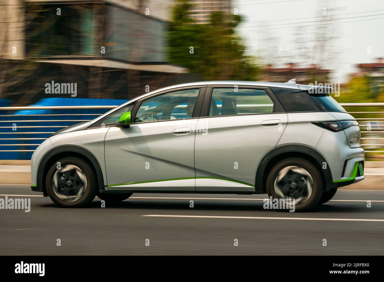 BYD Dolphin small electric hatchback car being driven on the road in ...
