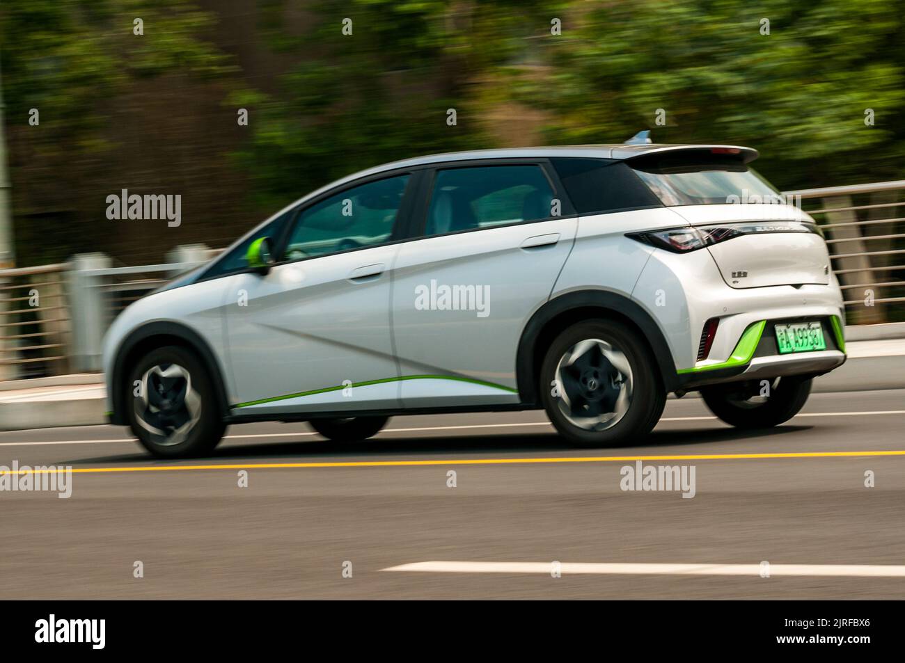 BYD Dolphin small electric hatchback car being driven on the road in ...