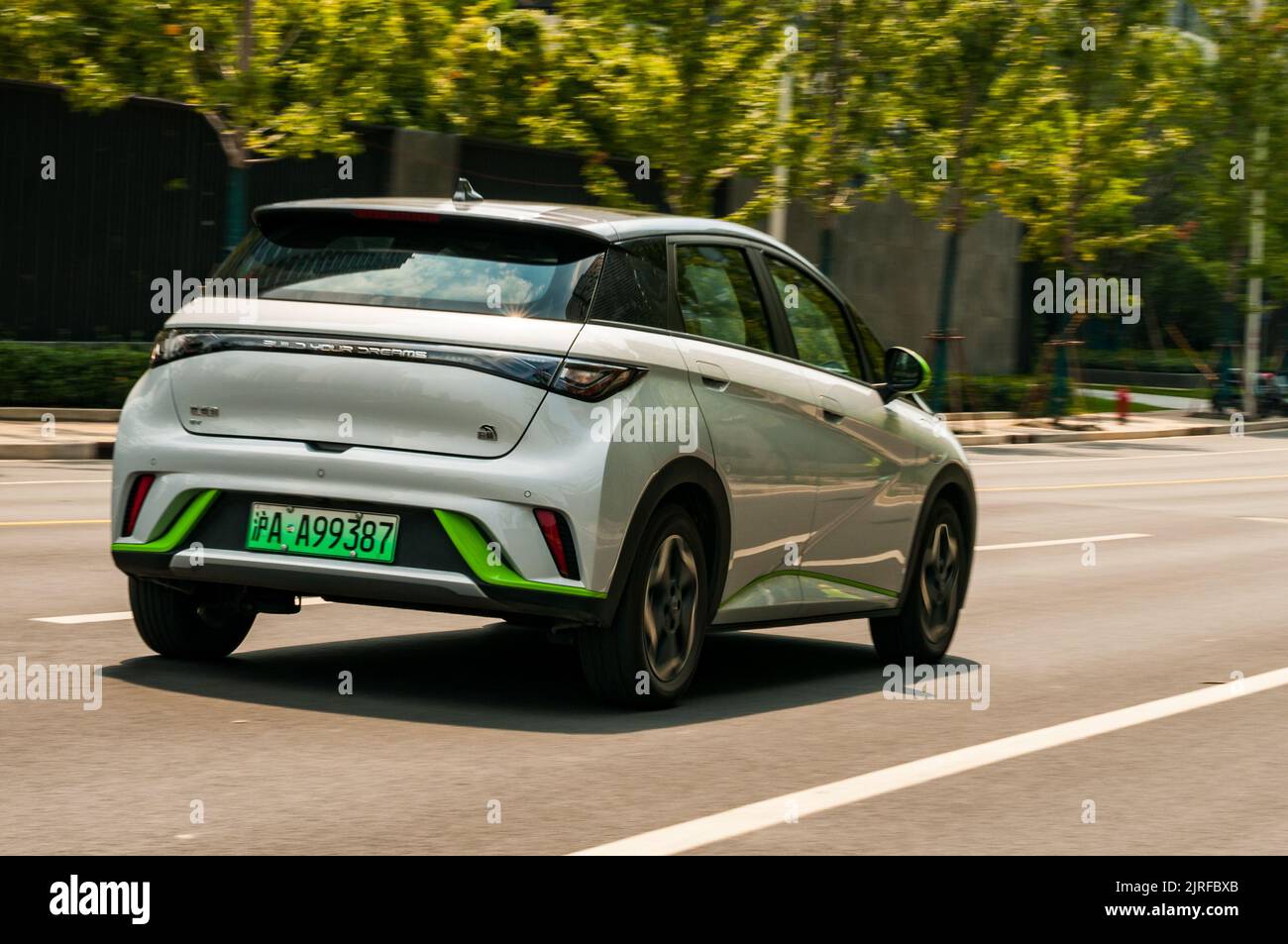 BYD Dolphin small electric hatchback car being driven on the road in ...