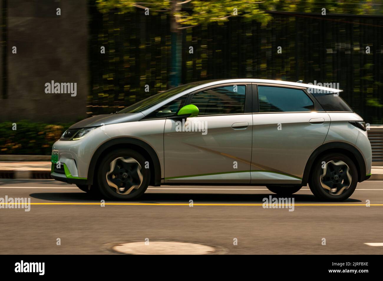 BYD Dolphin small electric hatchback car being driven on the road in ...
