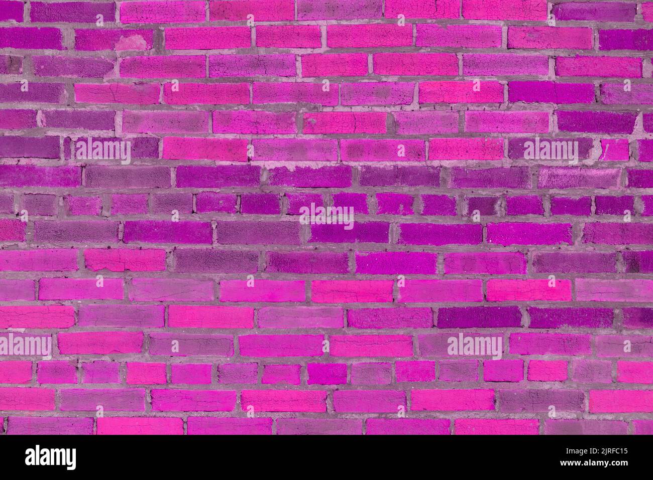 A pink brick wall of the building Stock Photo - Alamy