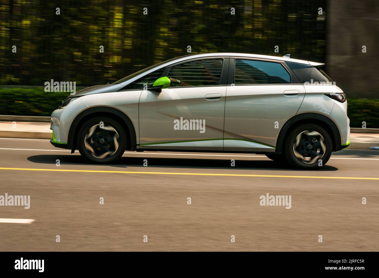 BYD Dolphin small electric hatchback car being driven on the road in ...