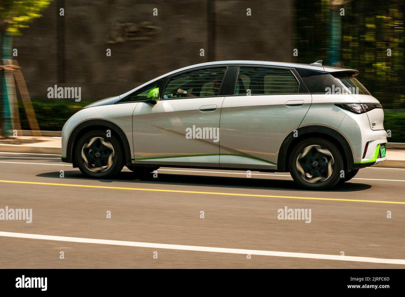 BYD Dolphin small electric hatchback car being driven on the road in ...