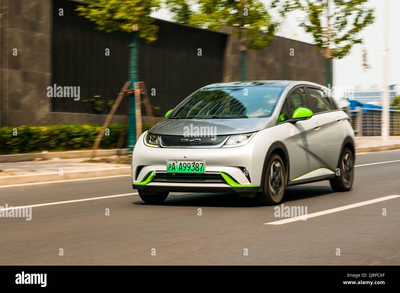 BYD Dolphin small electric hatchback car being driven on the road in ...