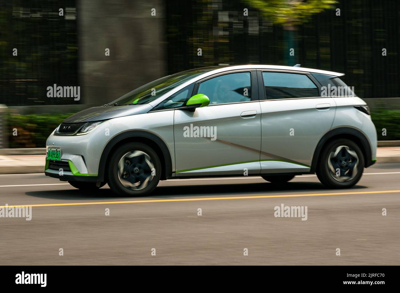 BYD Dolphin small electric hatchback car being driven on the road in ...