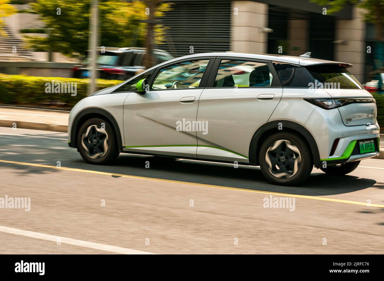 BYD Dolphin small electric hatchback car being driven on the road in ...