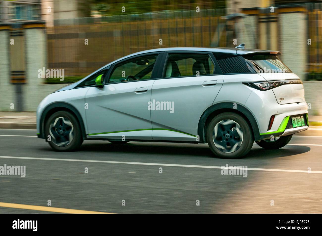 BYD Dolphin small electric hatchback car being driven on the road in ...