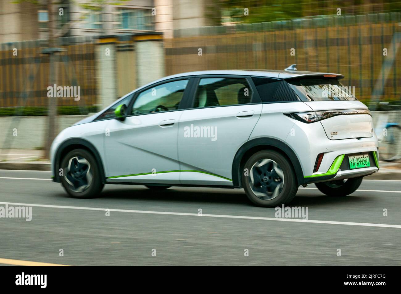 BYD Dolphin small electric hatchback car being driven on the road in ...