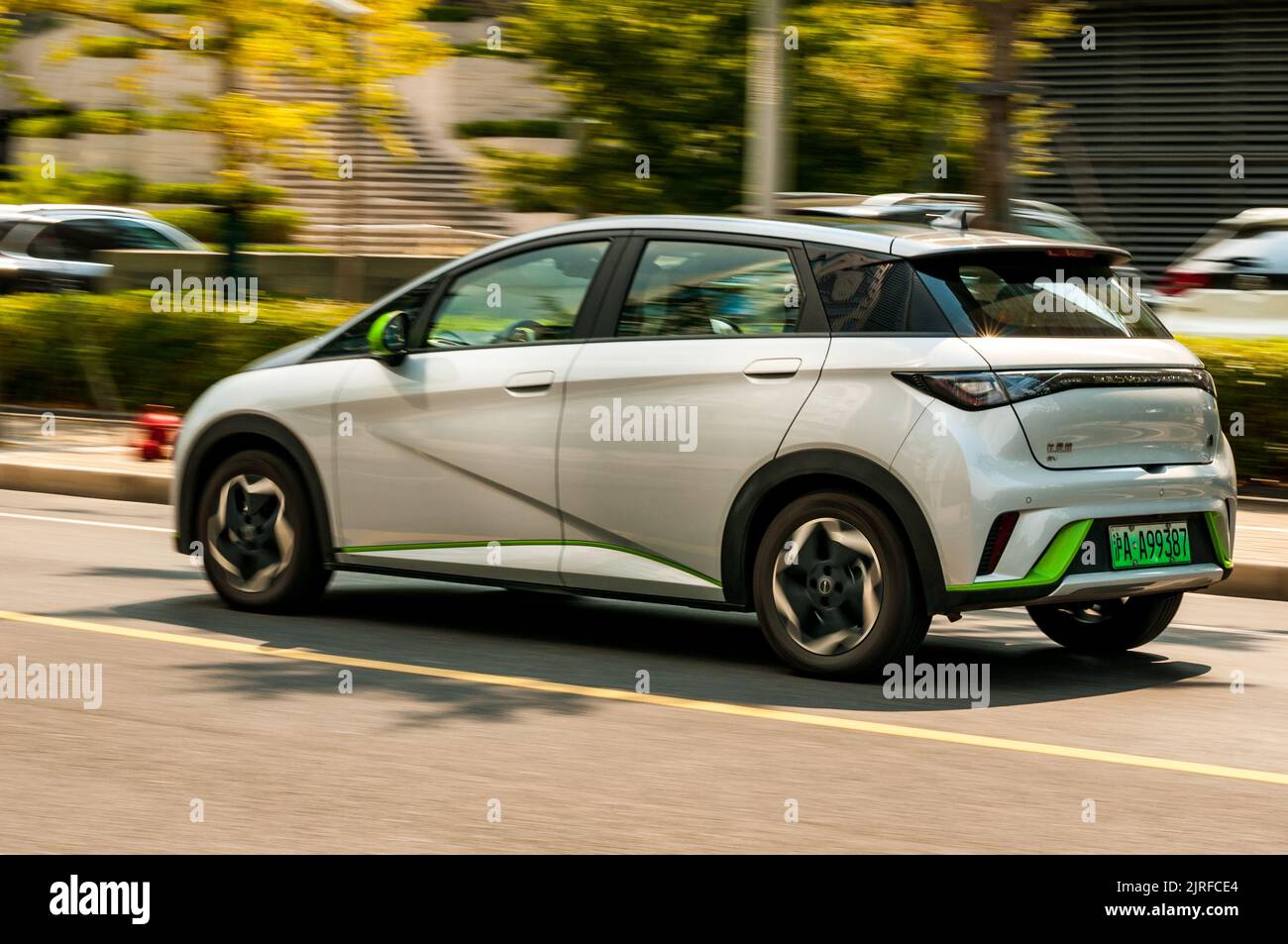 BYD Dolphin small electric hatchback car being driven on the road in ...