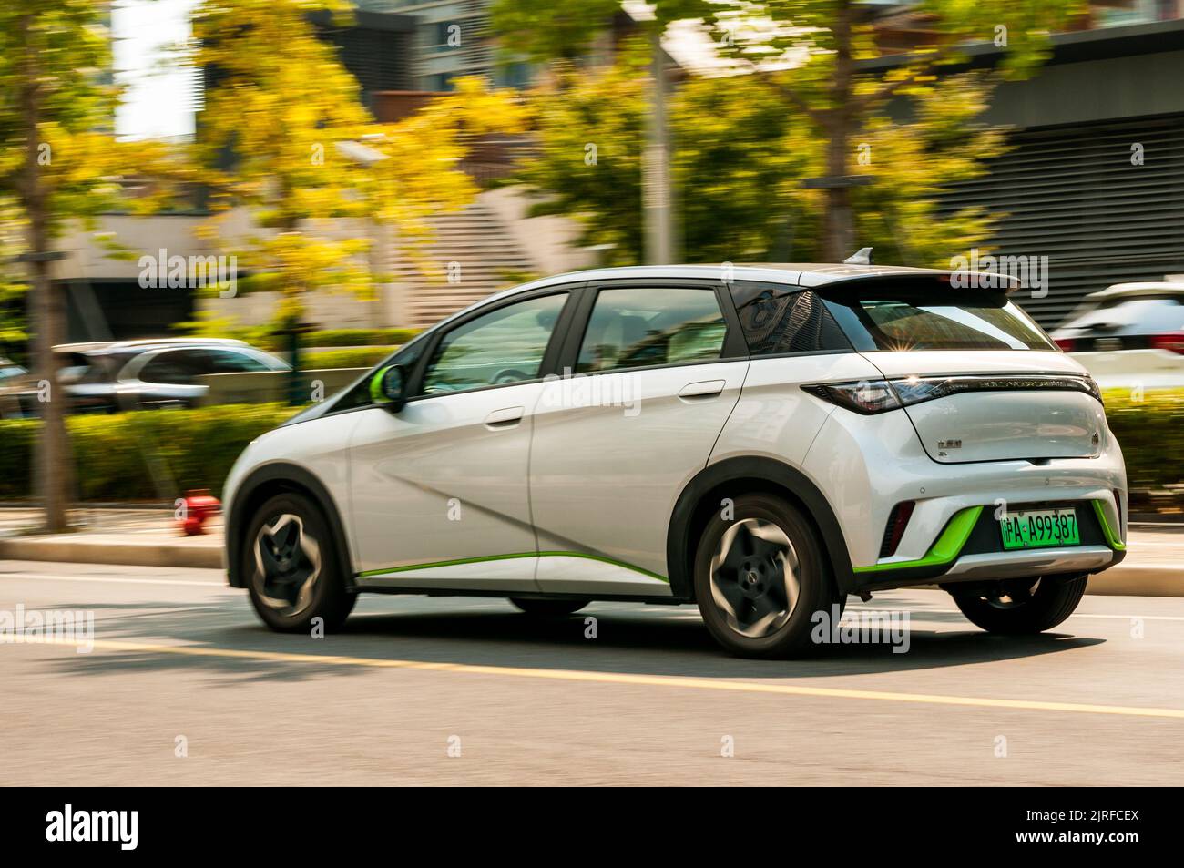 BYD Dolphin small electric hatchback car being driven on the road in ...
