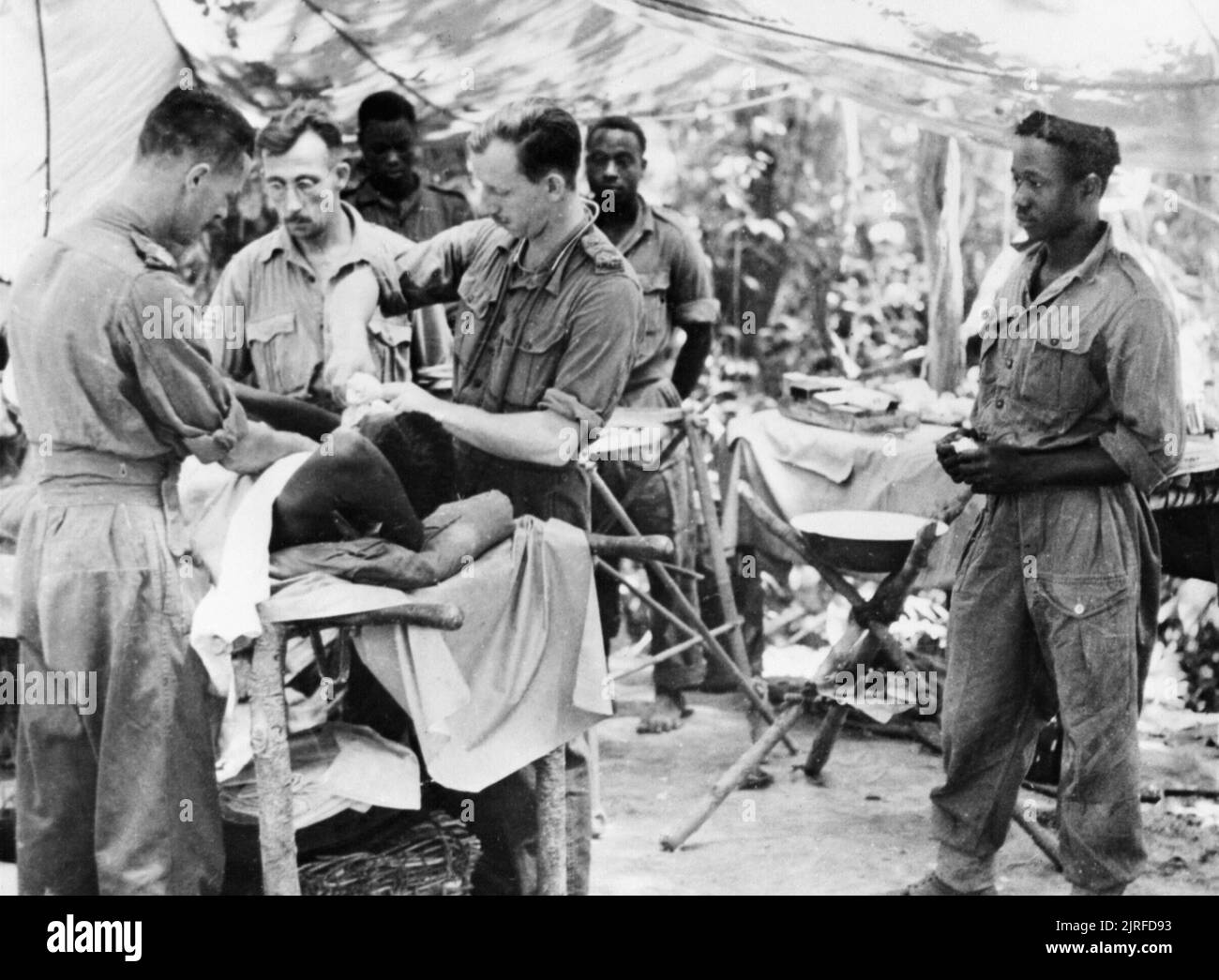 West African Casualties in Burma, August 1944 Doctors tend a wounded ...