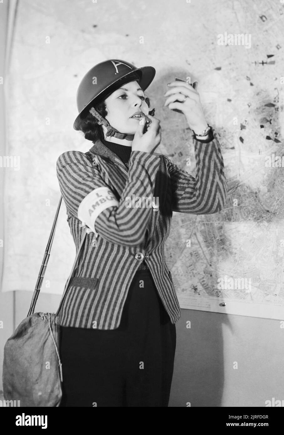 Arp at Kingston House, London, c 1940. A female member of Air Raid ...