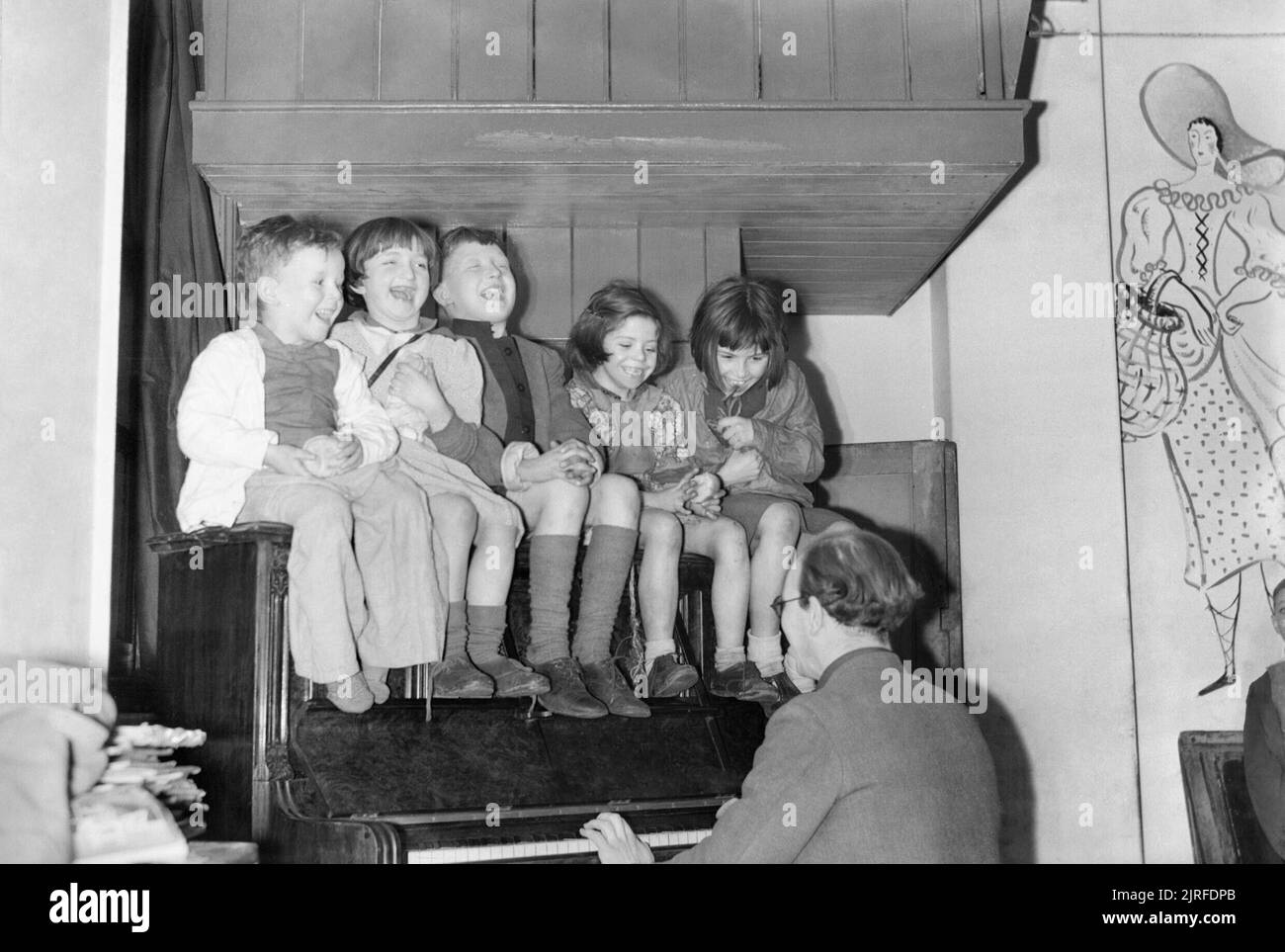 At a Save the Children club on Eversholt Street, London, during 1944 ...
