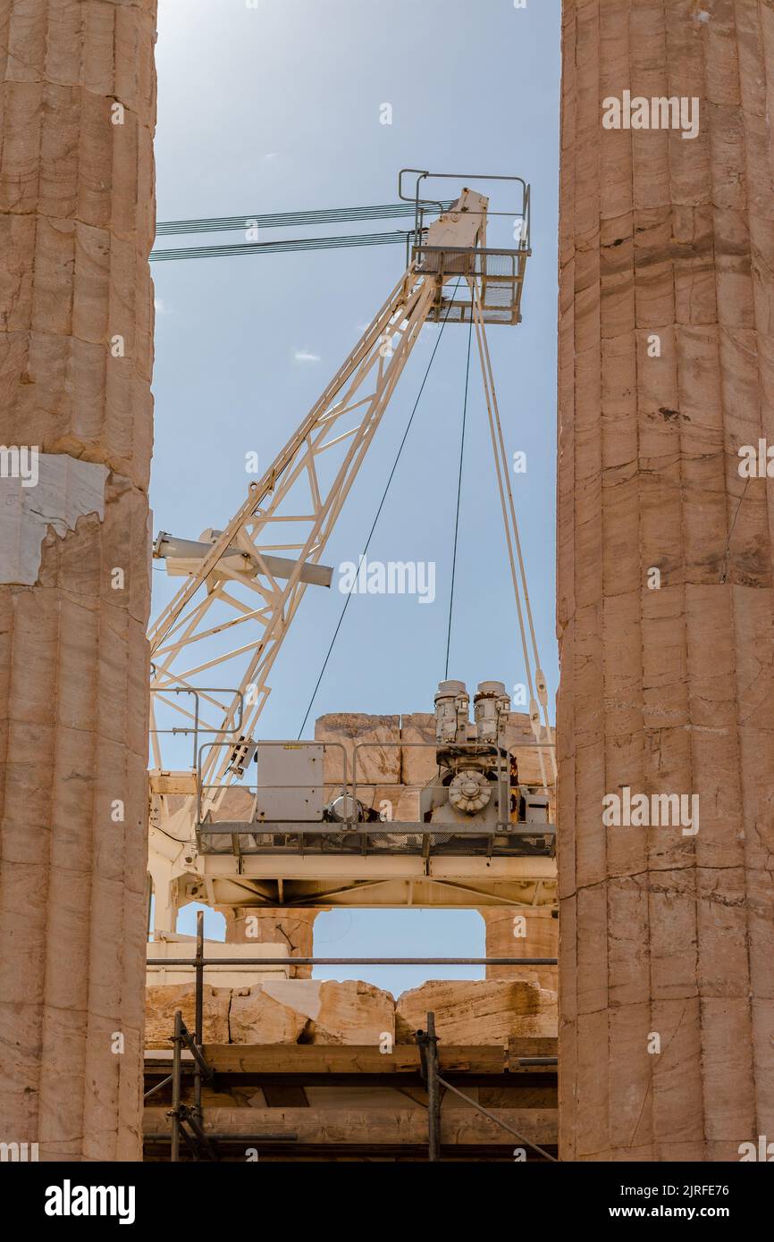 A vertical shot of the construction process of the Parthenon with tower ...