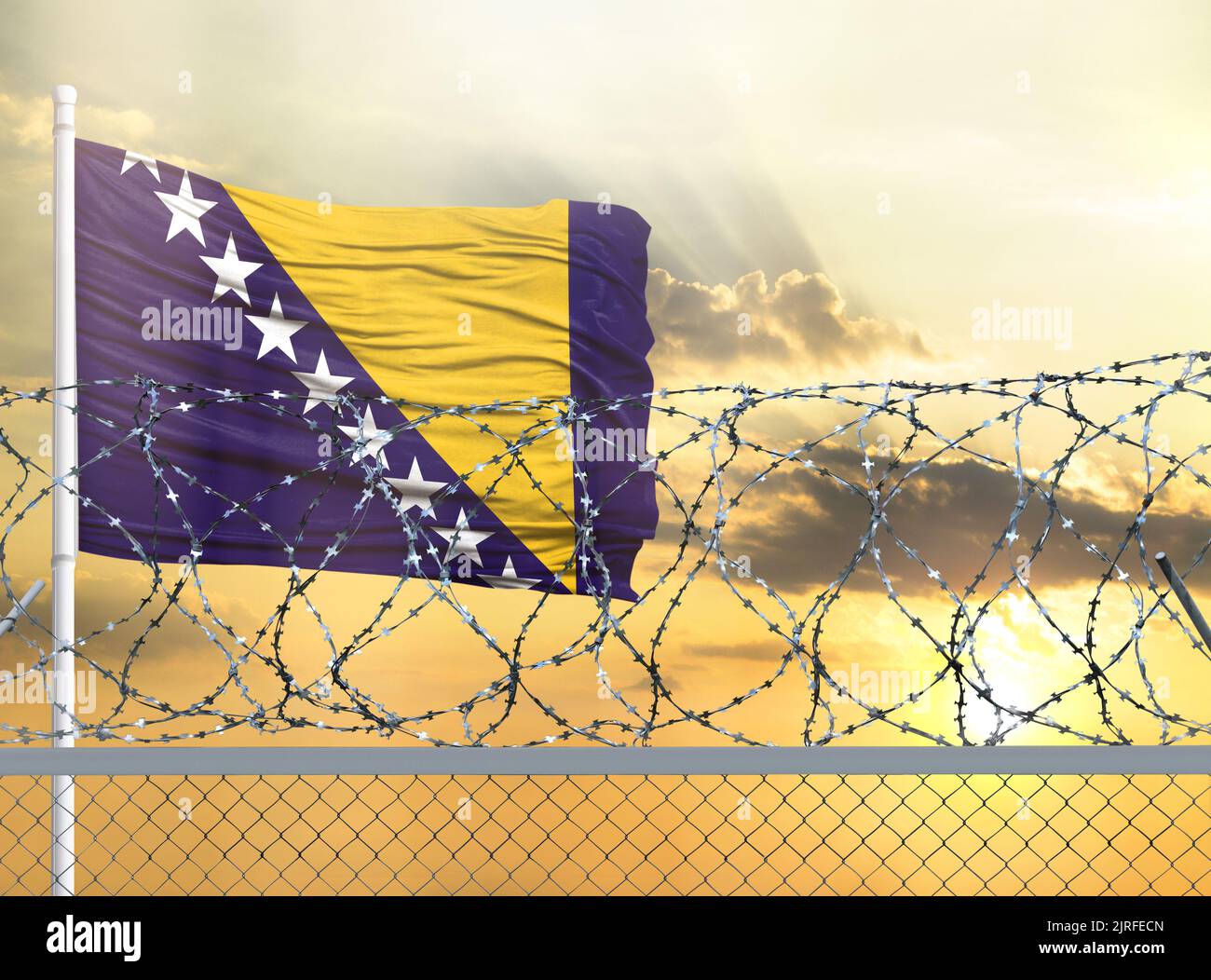 Flagpole with the flag of Bosnia and Herzegovina against the sky and ...