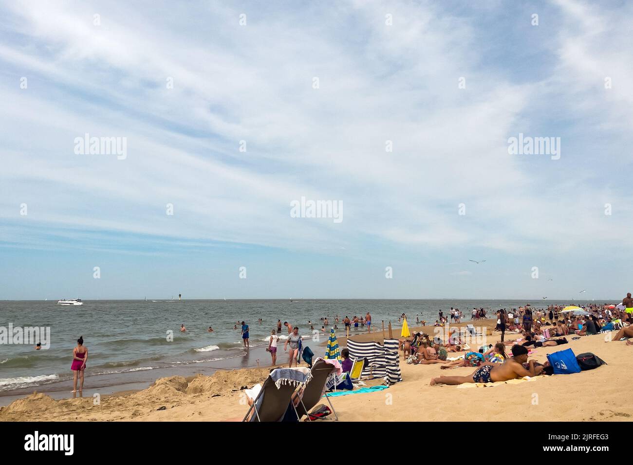 Crowd enjoying on beach hi-res stock photography and images - Alamy