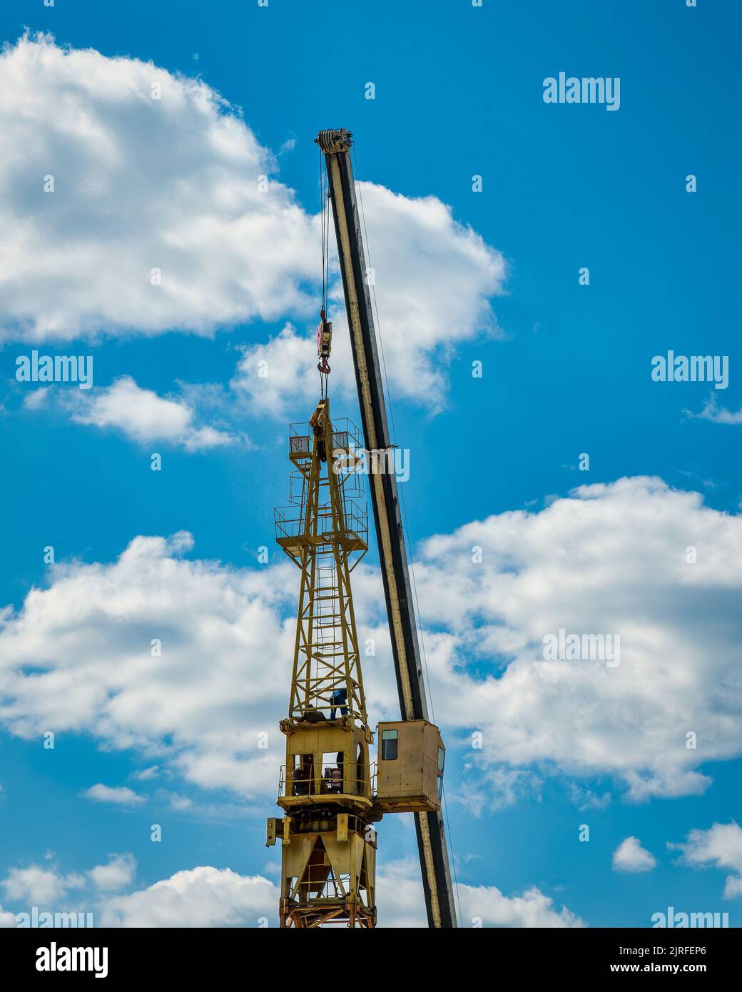 Tower crane assembly. Installation of a construction crane before ...