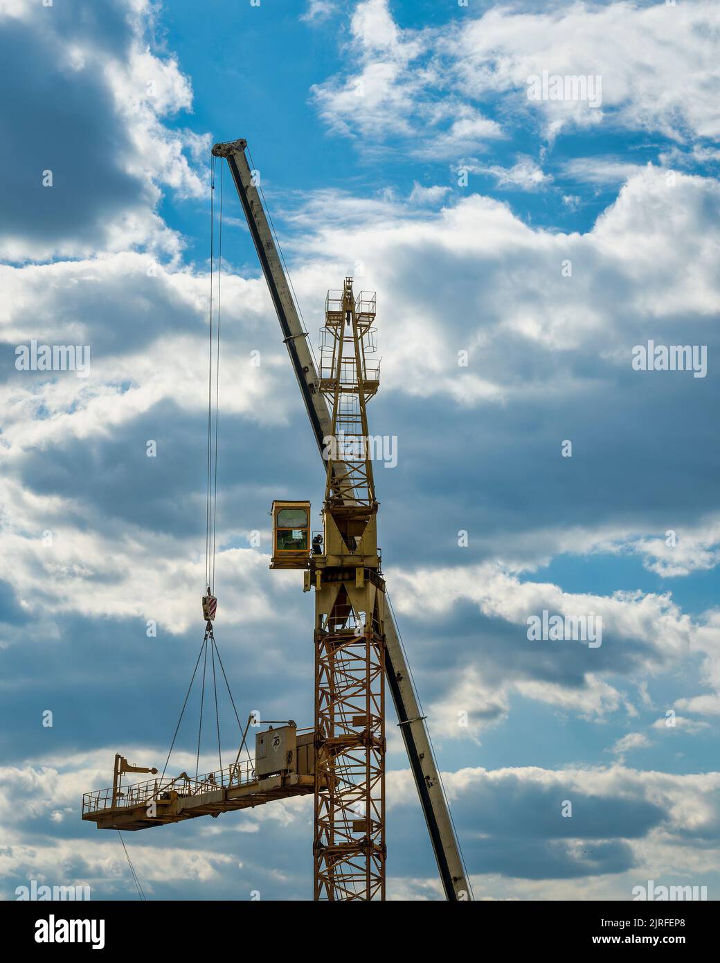 Tower crane assembly. Installation of a construction crane before ...
