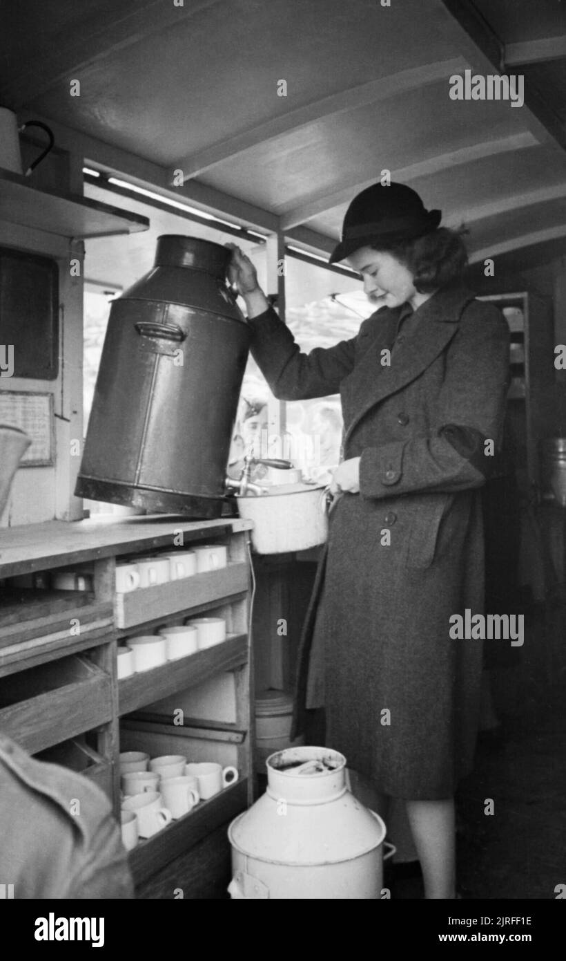 A member of the Women's Voluntary Service (WVS) in her mobile canteen ...