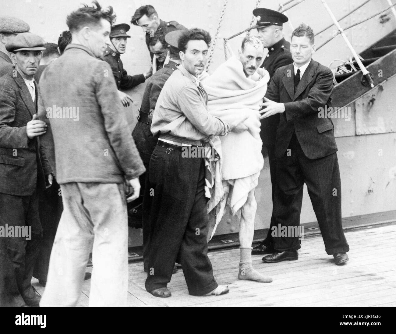 Sinking of Ss Athenia, 1939 An injured passenger, wrapped in a blanket ...