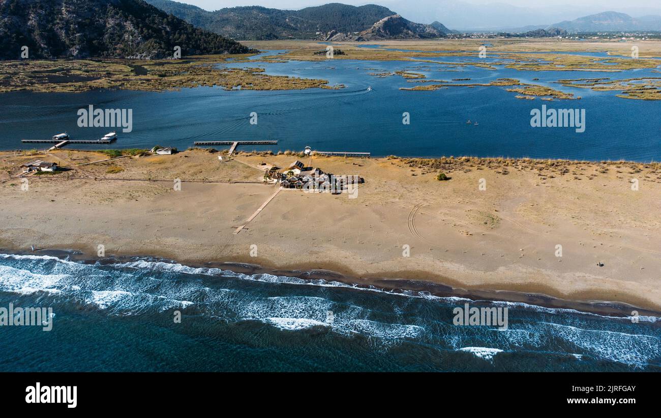 Aeriel scenic drone view to Iztuzu beach and the Dalyan river Delta or ...