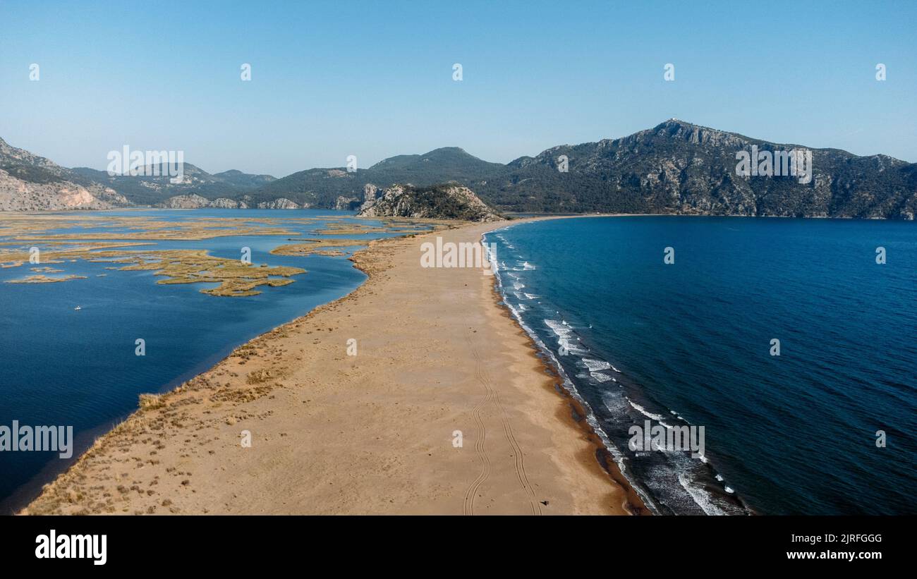 Aeriel scenic drone view to Iztuzu beach and the Dalyan river Delta or ...